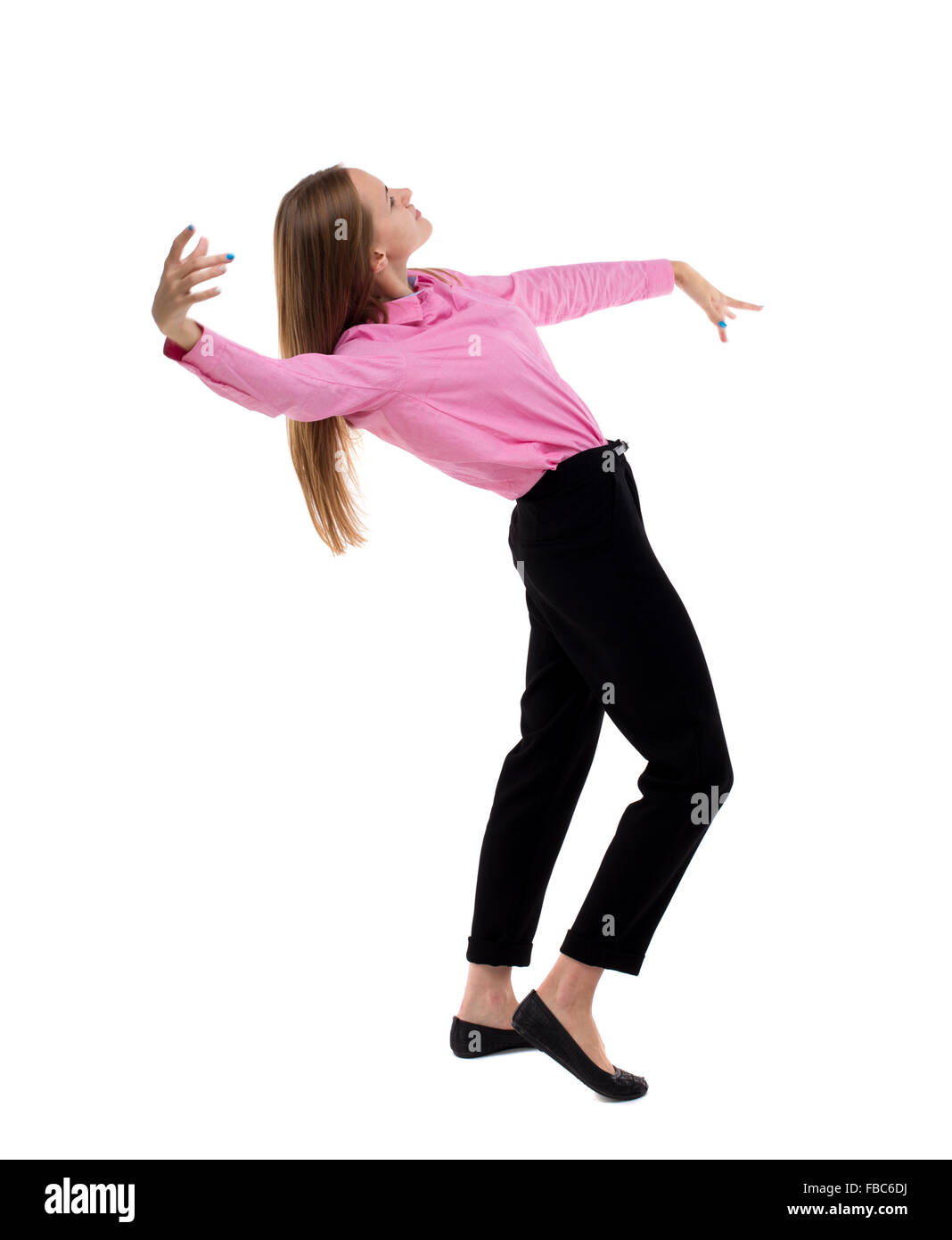 Balancing young business woman. or dodge falling woman. Rear view ...