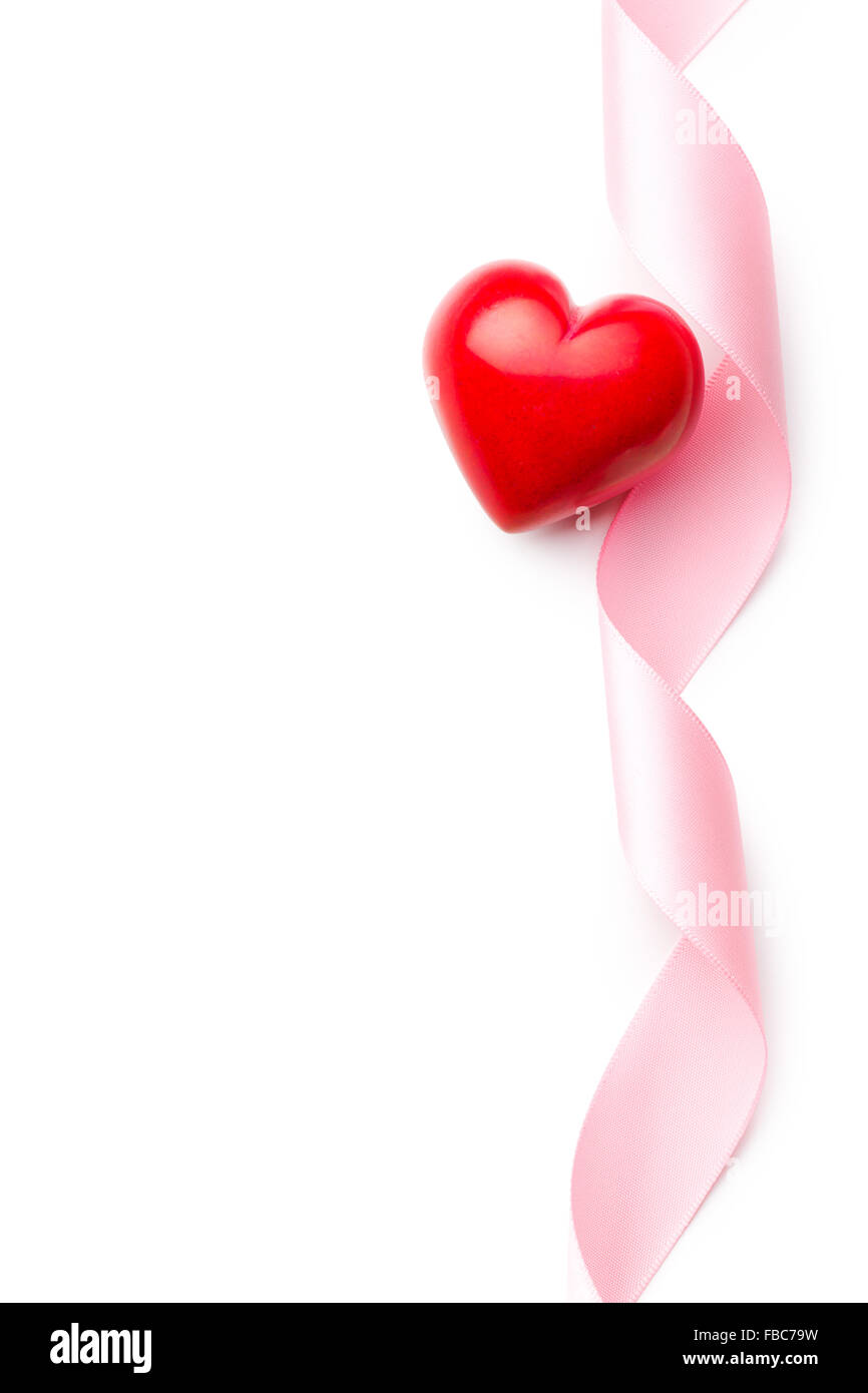 pink ribbon with red heart on white background Stock Photo - Alamy