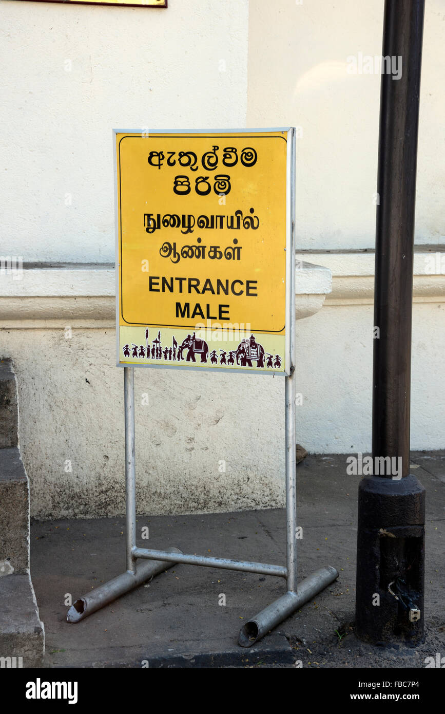 A sign for the Male entrance outside the main entrance to the Temple of ...