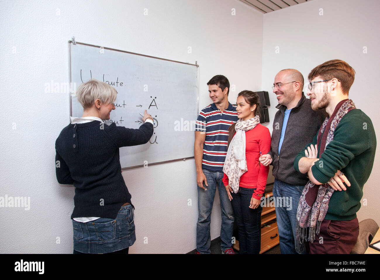 Adults learning a second language hi-res stock photography and images ...