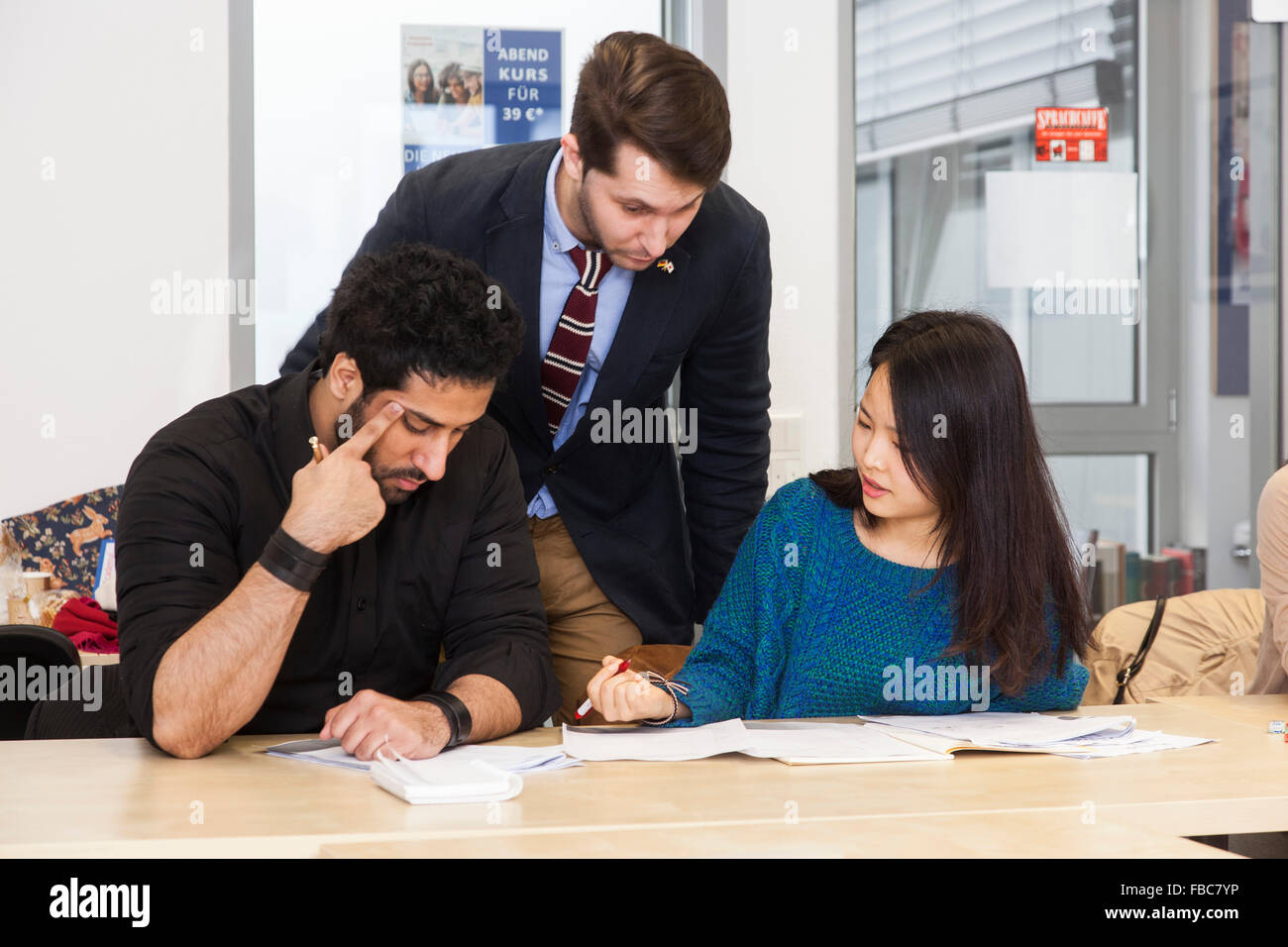 Adults learning a second language hi-res stock photography and images ...