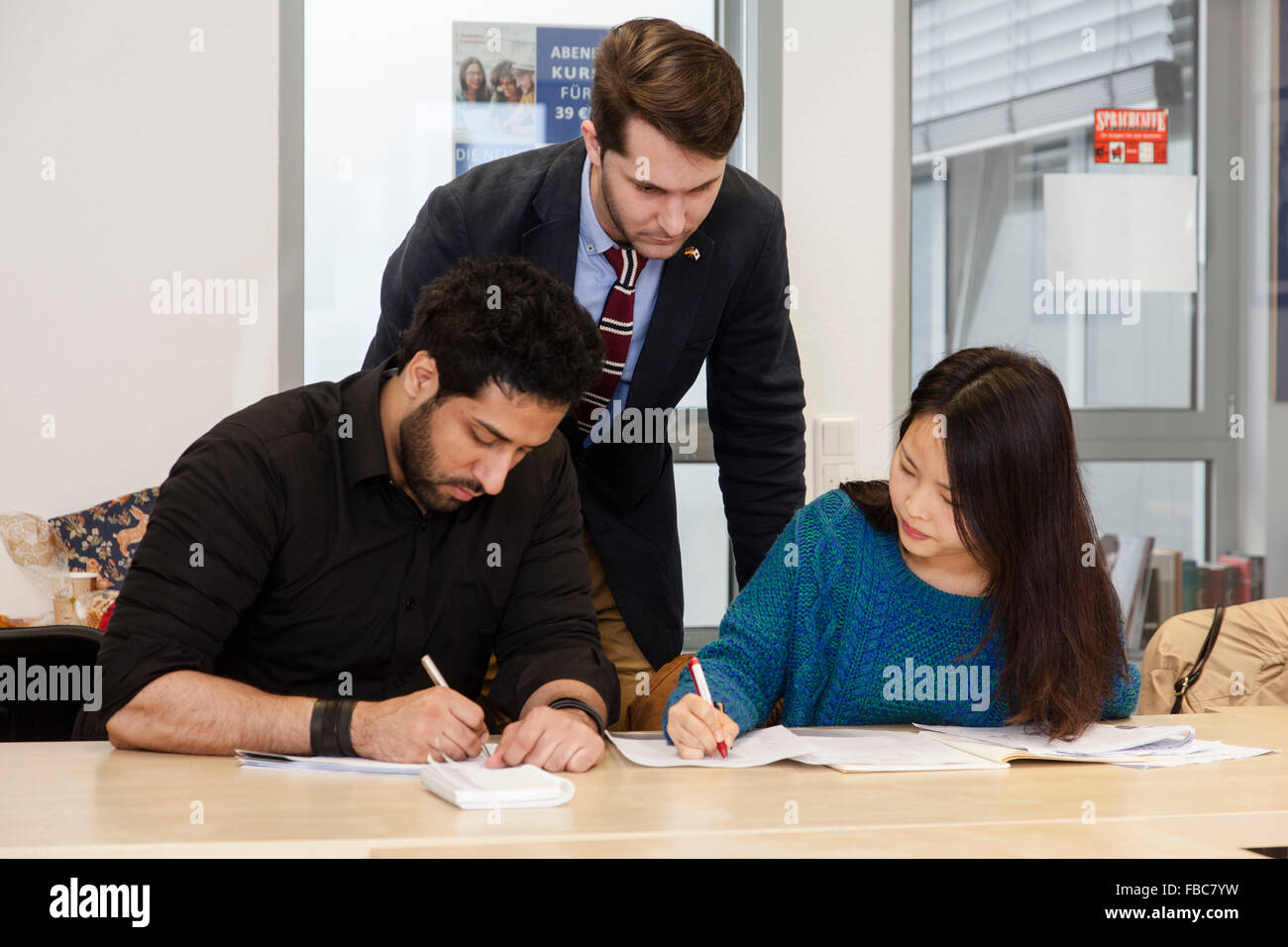 Adults learning a second language hi-res stock photography and images ...