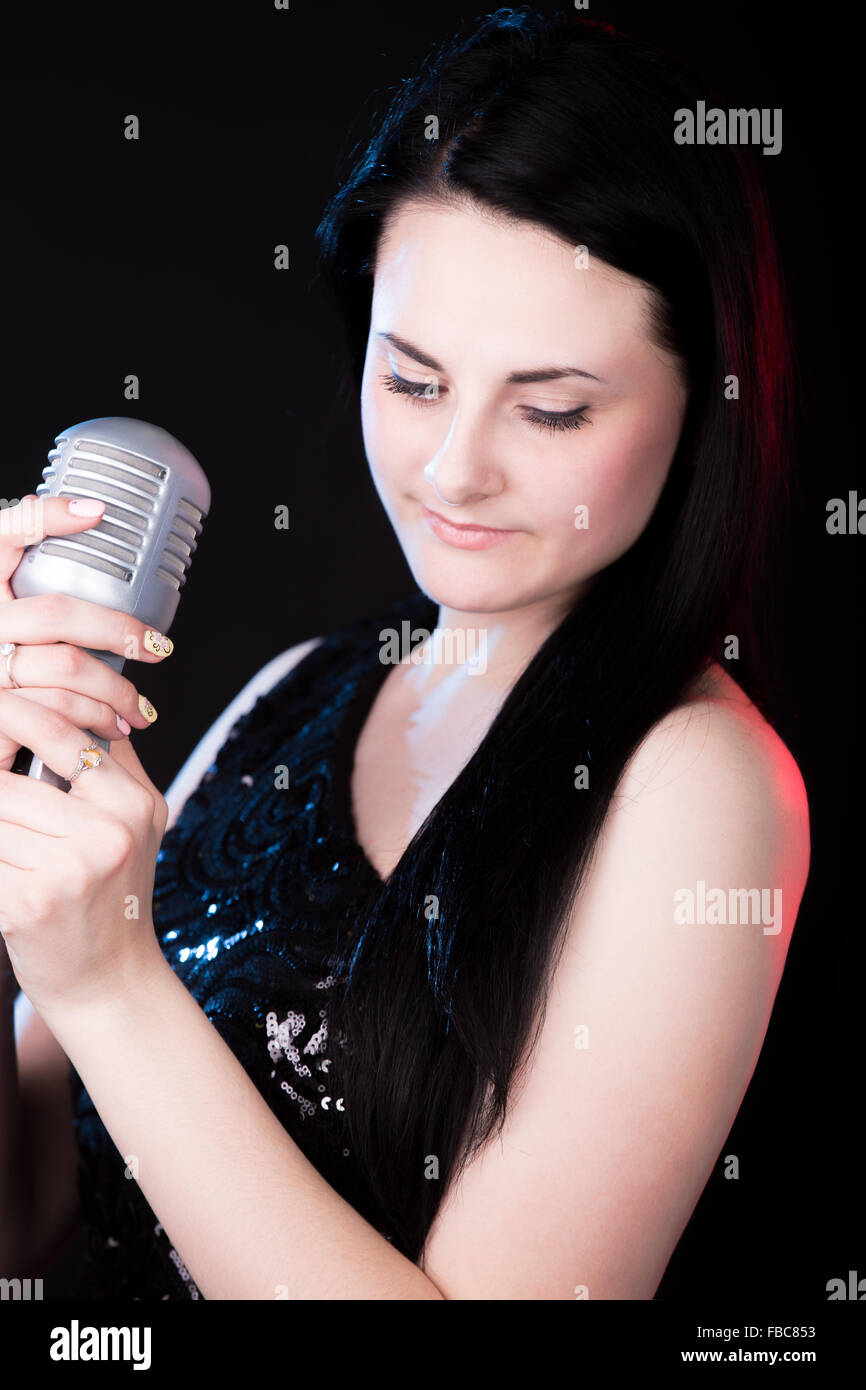 Woman microphone nervous hi-res stock photography and images - Alamy