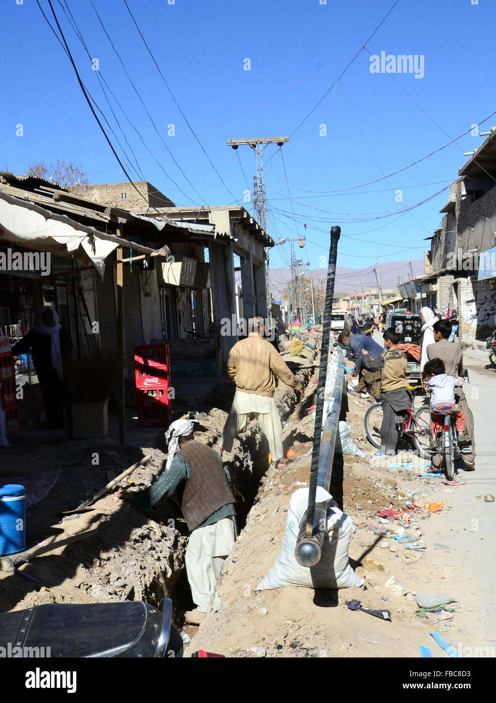 Sui Southern Gas Company officials busy in construction work of a new ...