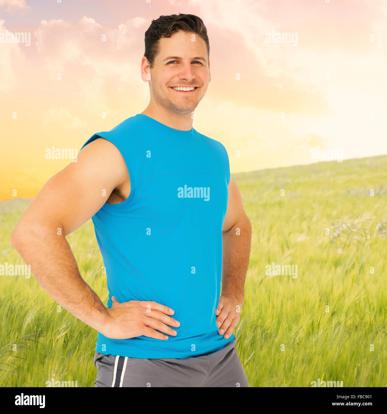 Composite image of portrait of a fit smiling young man Stock Photo - Alamy