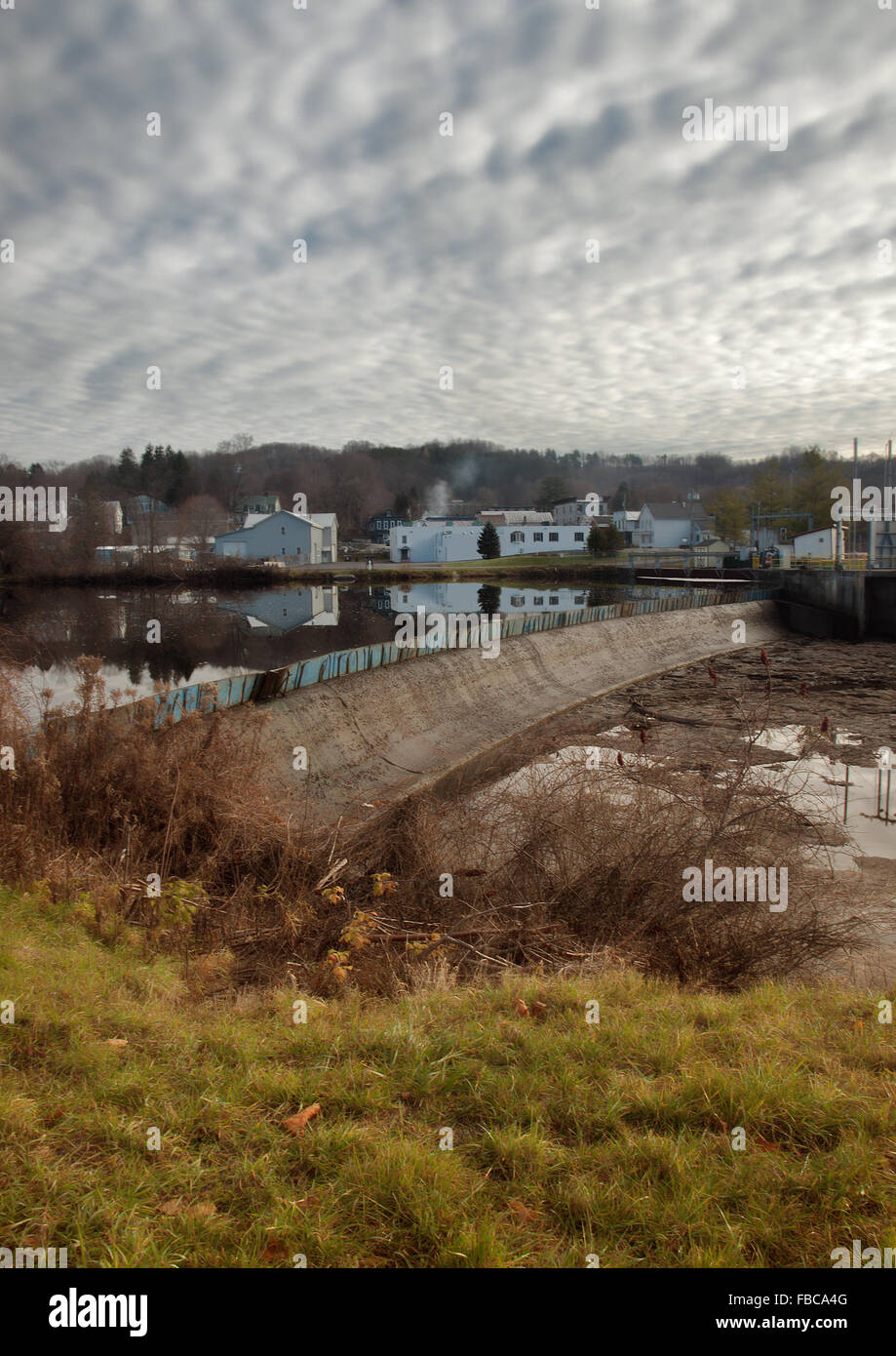 Dam on a river in a small rural industrial town Stock Photo - Alamy