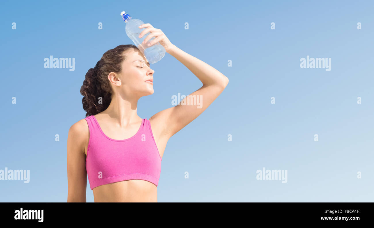 Composite image of fit woman with water Stock Photo - Alamy