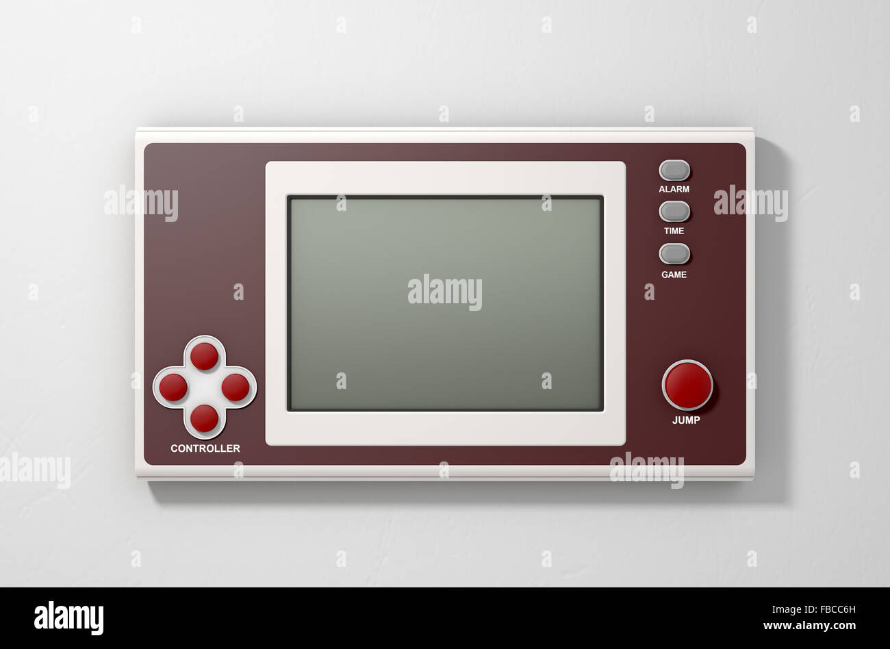 A vintage handheld video game console with a blank screen on an ...