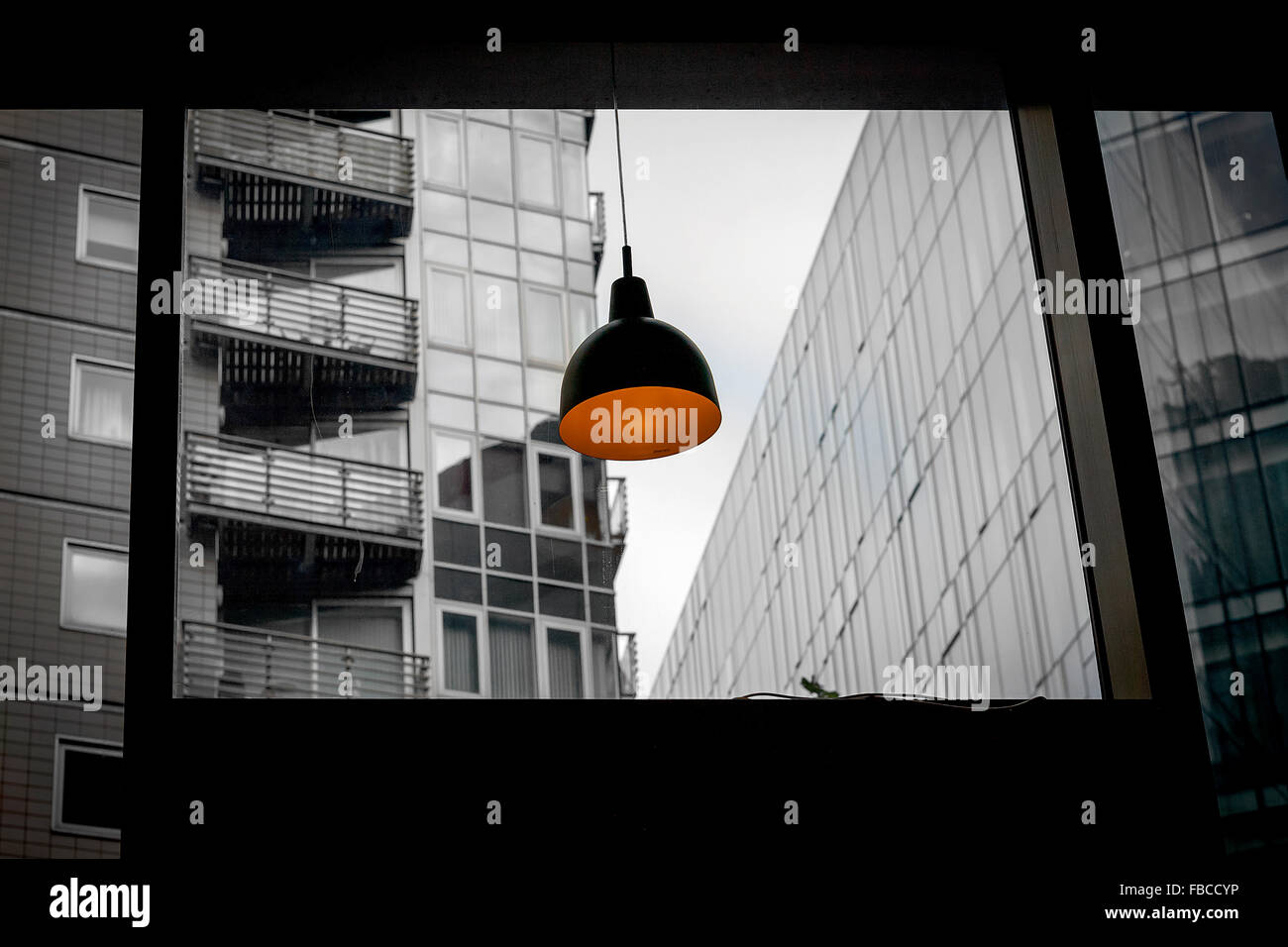 City apartments through window hi-res stock photography and images - Alamy