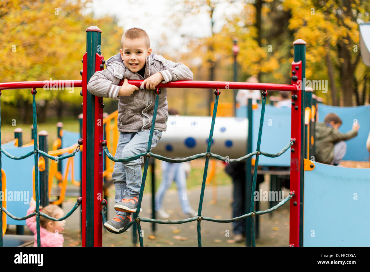Little boy at playground Stock Photo - Alamy