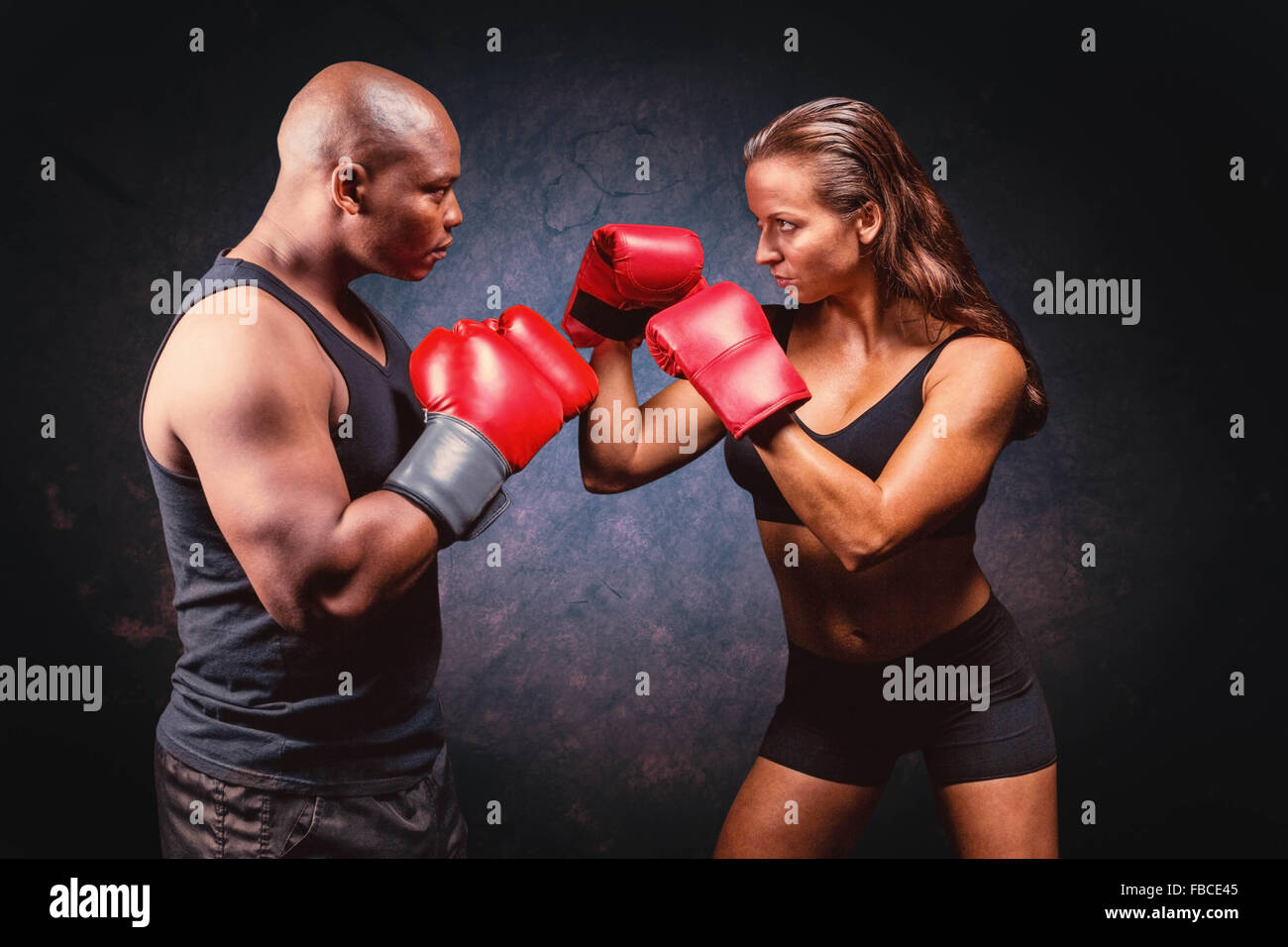 Composite image of male and female boxer with fighting stance Stock ...