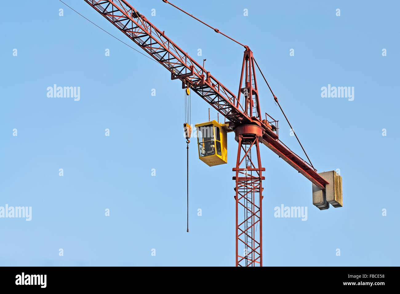Construction crane close up on sky background Stock Photo - Alamy