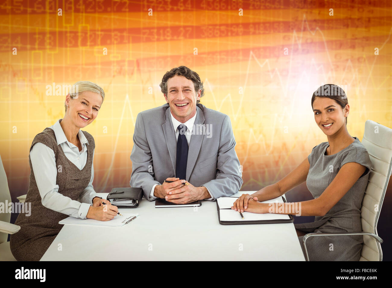 Composite image of portrait of smiling business people sitting at ...