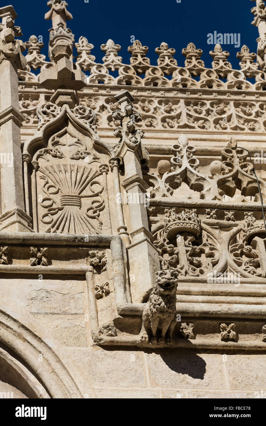 Gargoyles and coats of arms and sculptures on the wall of Granada ...