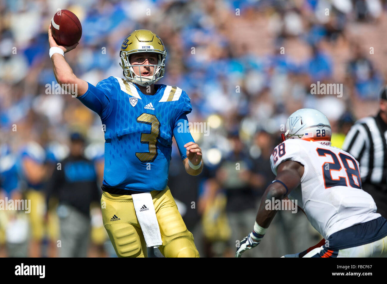 Quarterback Josh Rosen #3 of the UCLA Bruins throws a pass for a ...