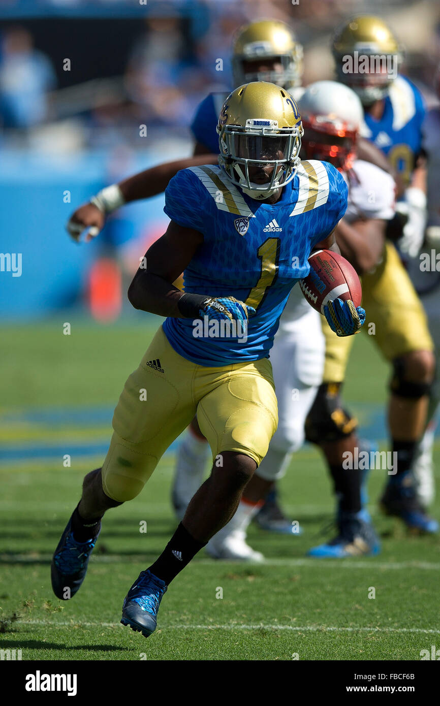 African football player running ball hi-res stock photography and ...
