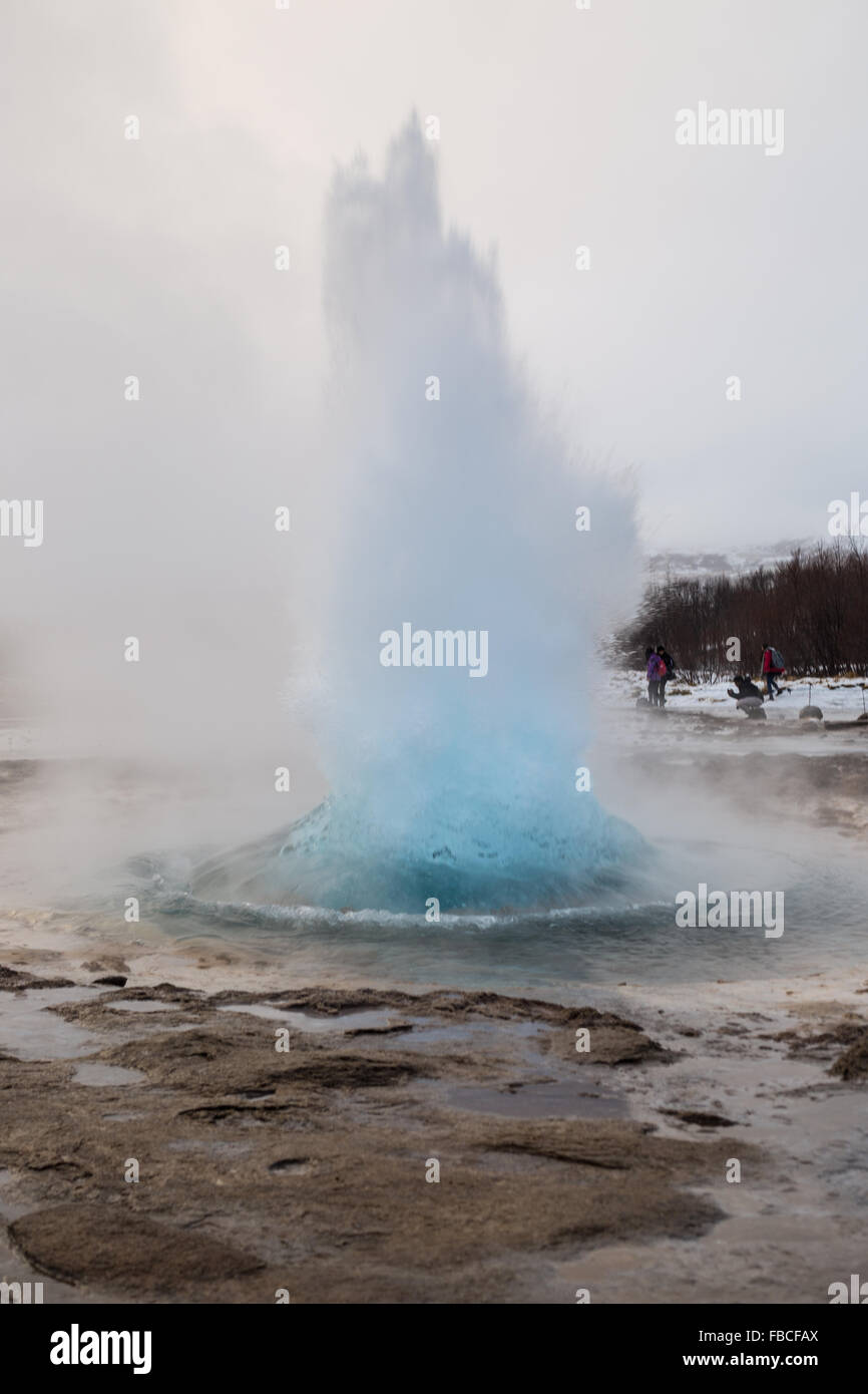 Geyser activity in Iceland - tourist attraction Stock Photo - Alamy