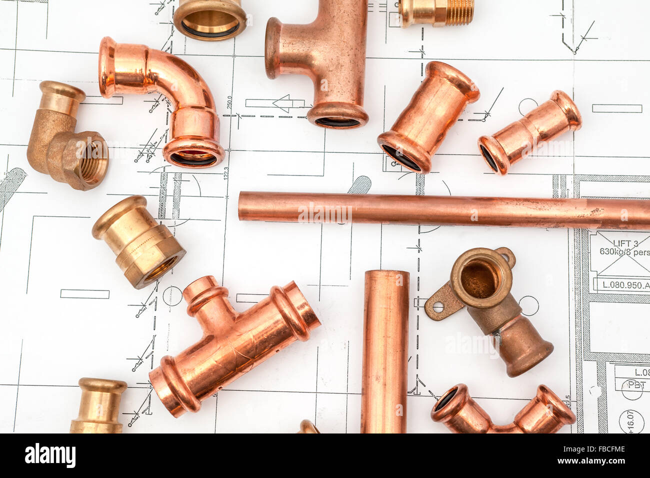 Plumbing Tools Arranged On House Plans Stock Photo - Alamy