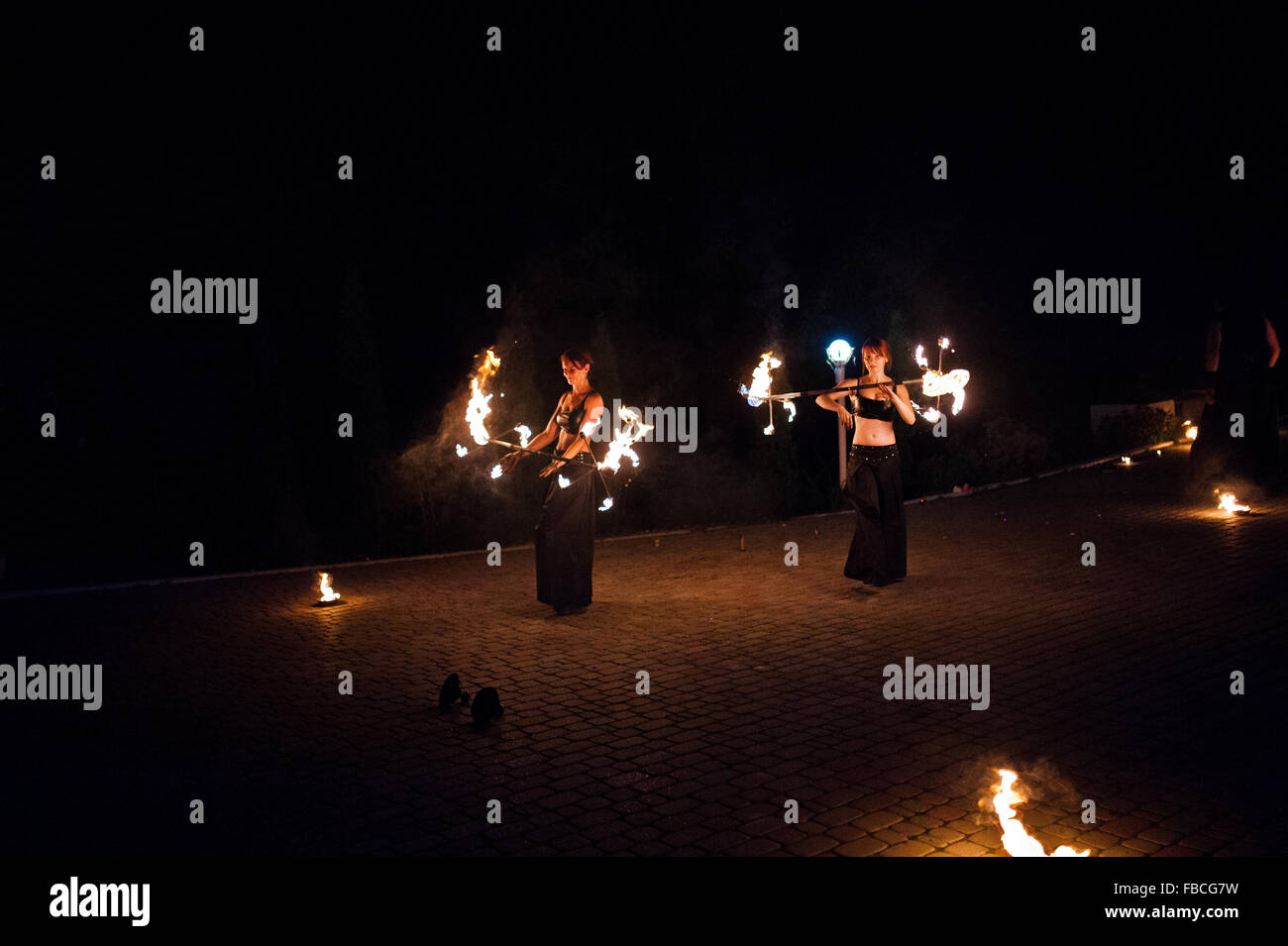 Amazing fire show on wedding ceremony at night Stock Photo - Alamy