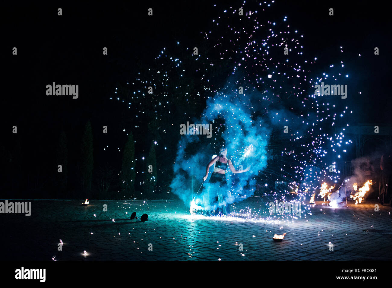 Amazing fire show on wedding ceremony at night Stock Photo - Alamy