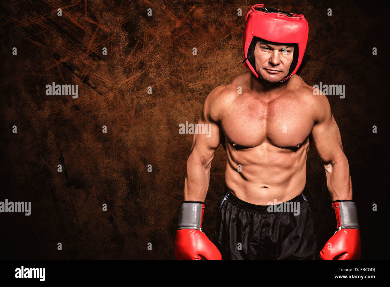 Composite image of portrait of shirtless man with boxing headgear and ...