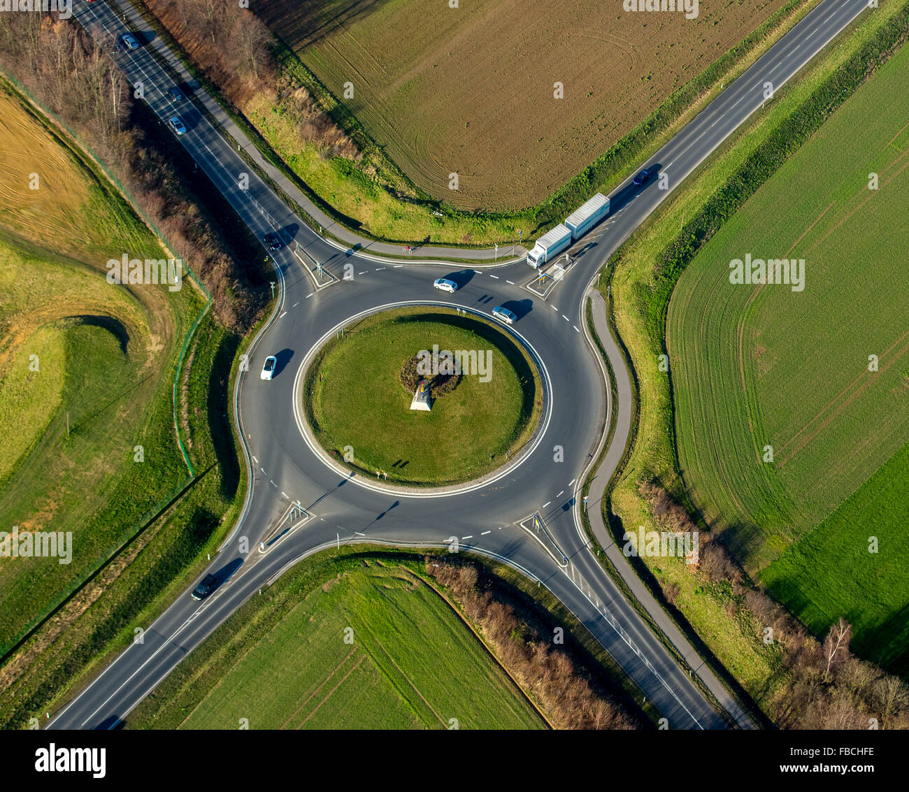 Aerial view, roundabout with four exits, truck, green center, lion ...
