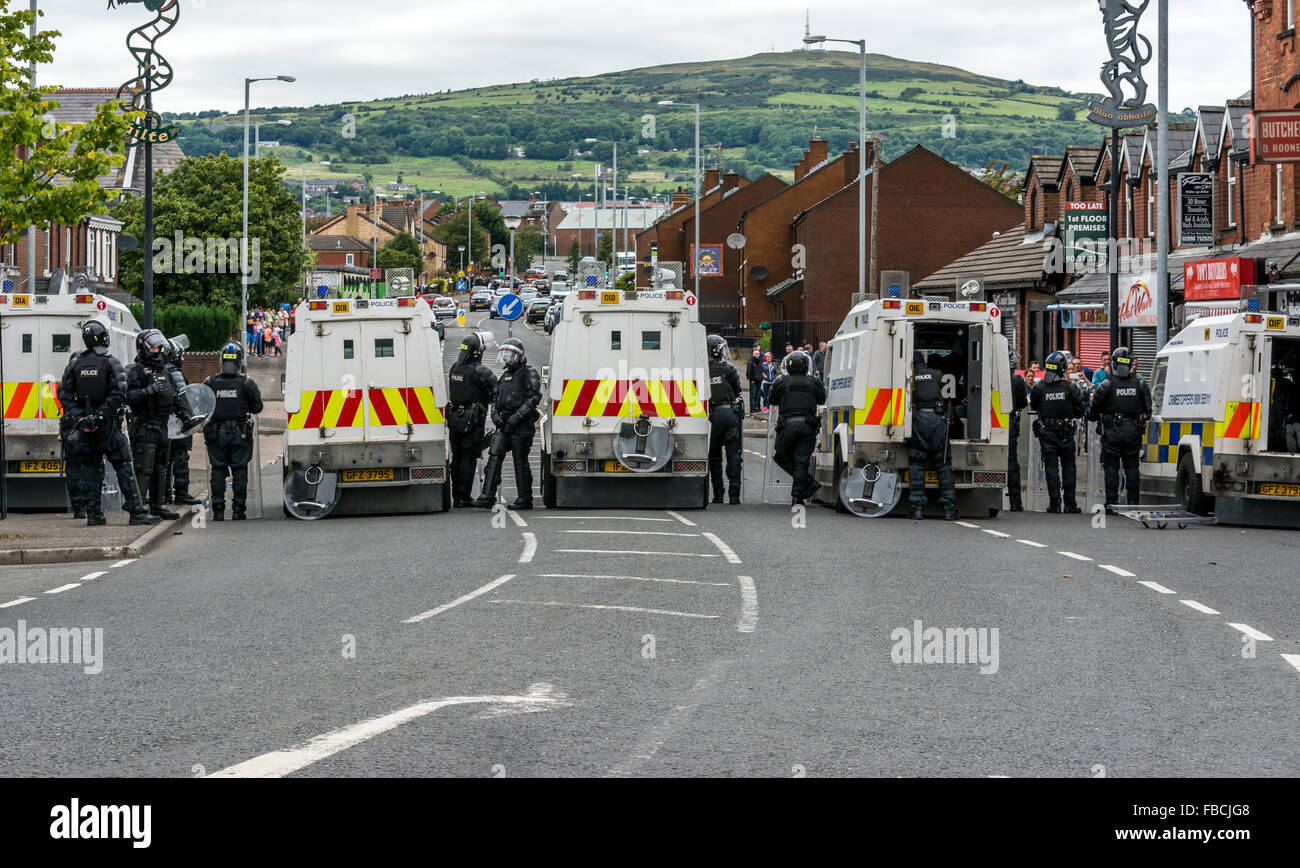 A line of PSNI land rovers blocked a Belfast road during riot Stock ...