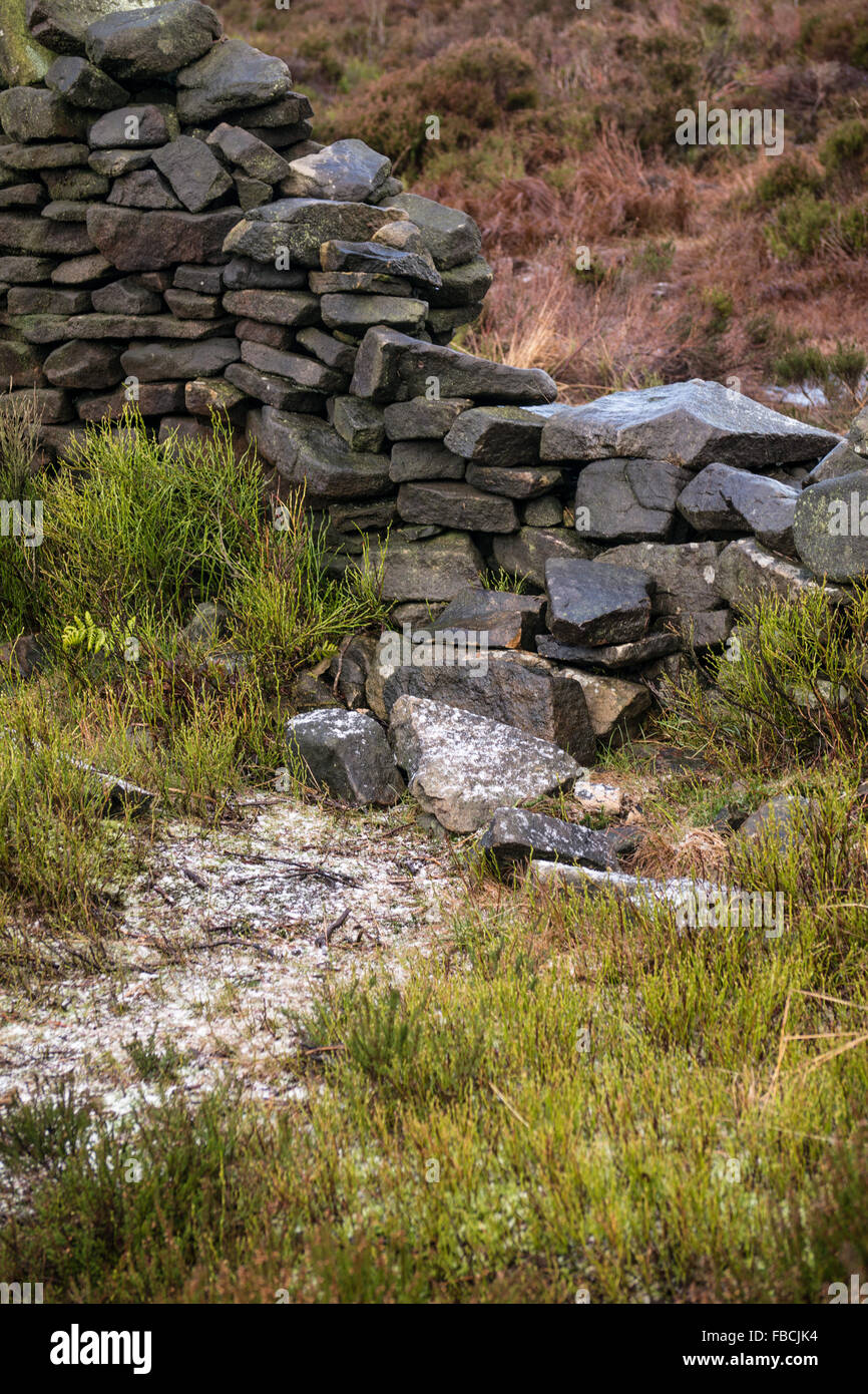 Damaged dry stone wall Stock Photo - Alamy