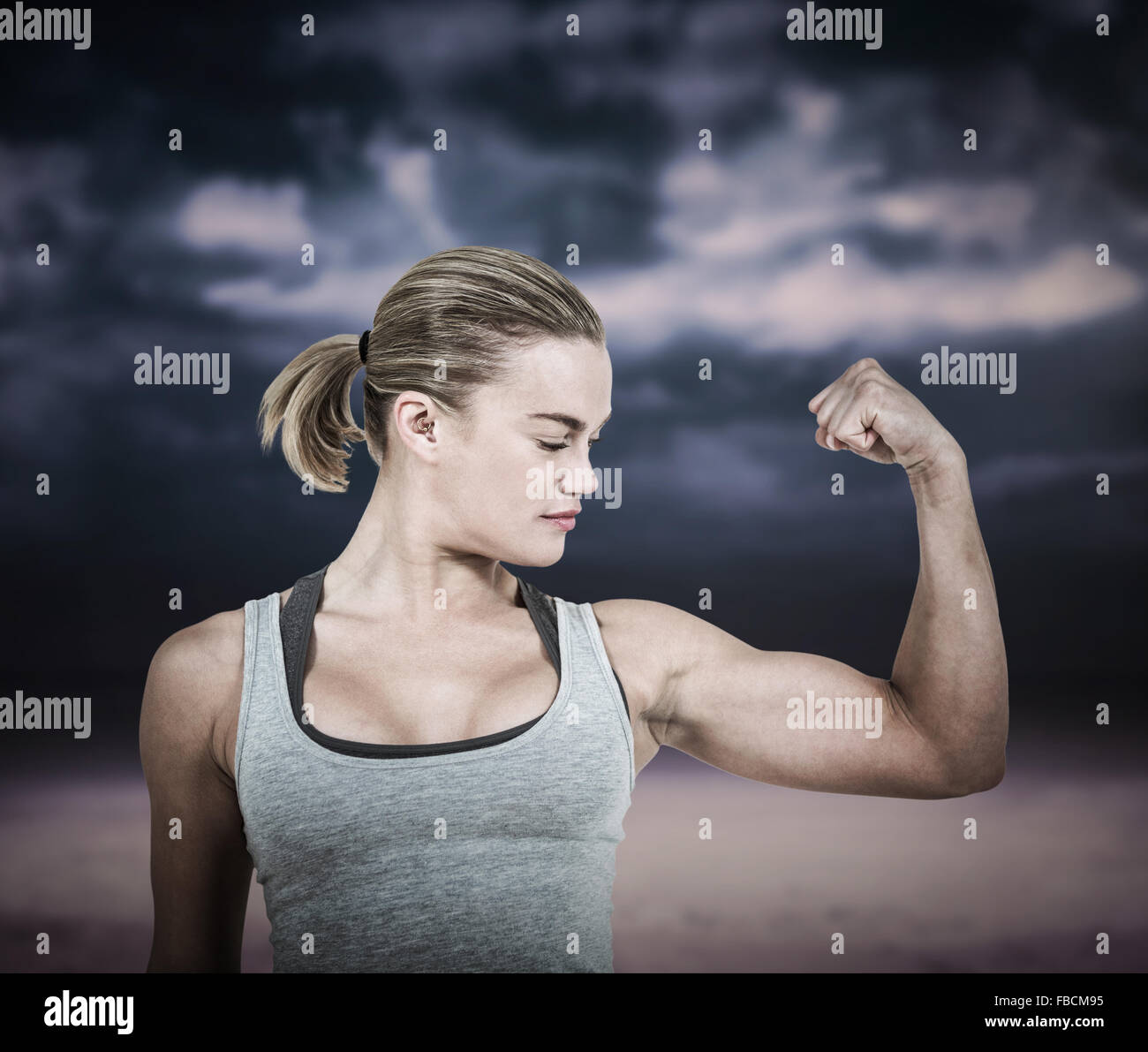 Composite image serious muscular woman hi-res stock photography and ...