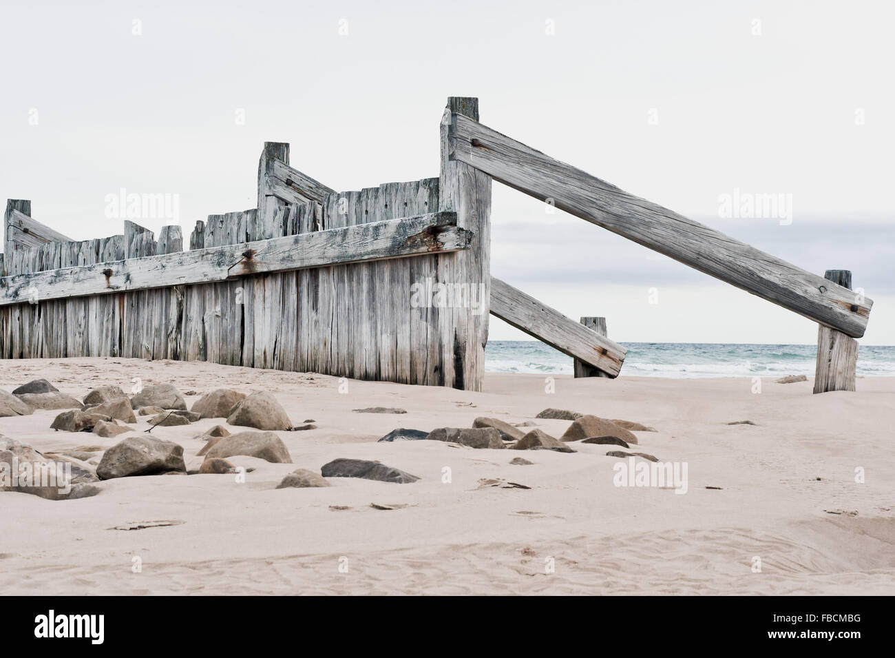 A breakwater formed of wooden panels on a beach in Scotland Stock Photo ...