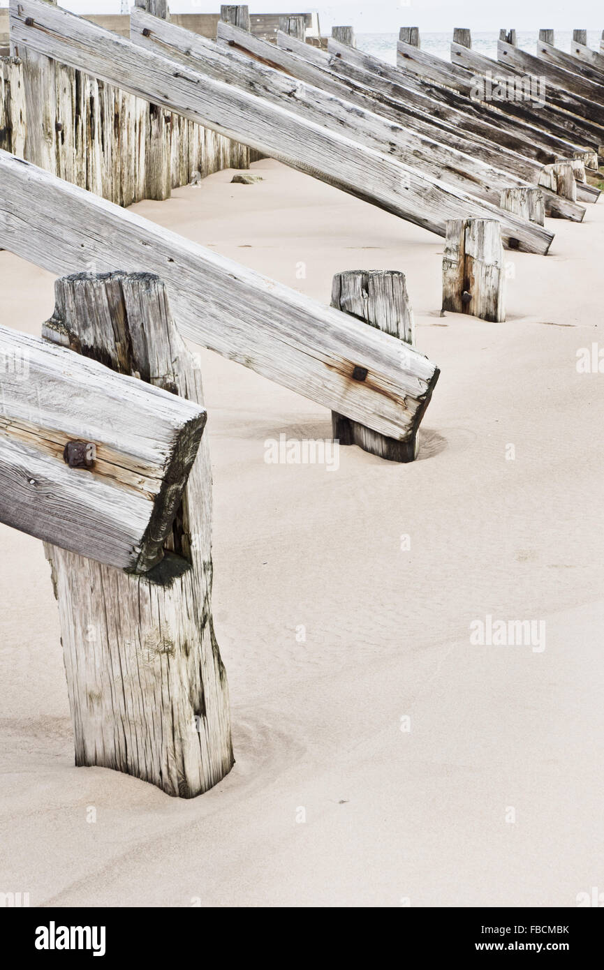 A breakwater formed of wooden panels on a beach in Scotland Stock Photo ...