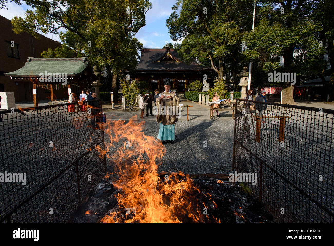 Nagoya, Japan. 14th January, 2016. A Shinto priest performs a fire ...