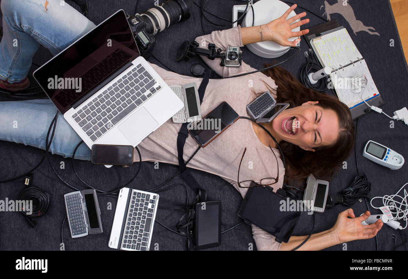 business woman surrounded by technology telecommunications, mobile ...