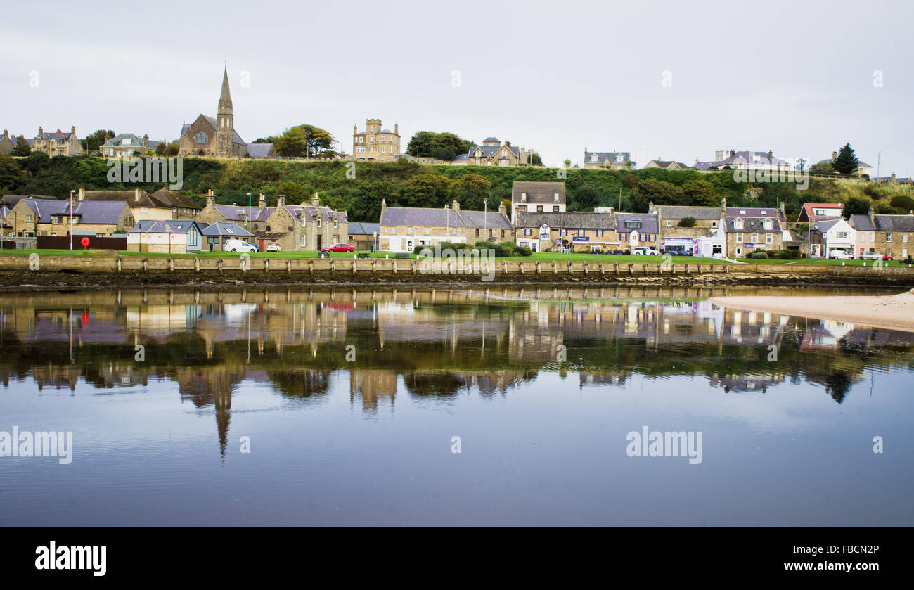 A view of Lossiemouth, Scotland across the estuary at high tide on an ...