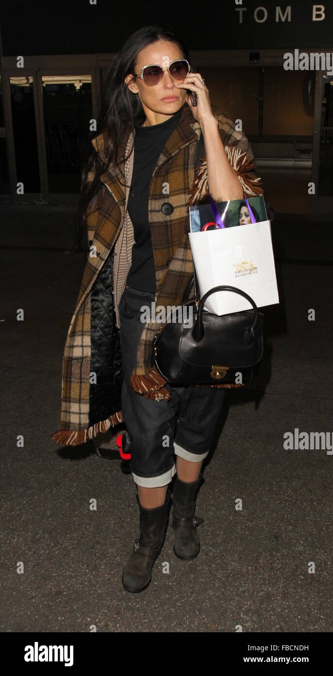 Demi Moore arrives on a flight to Los Angeles International Airport ...