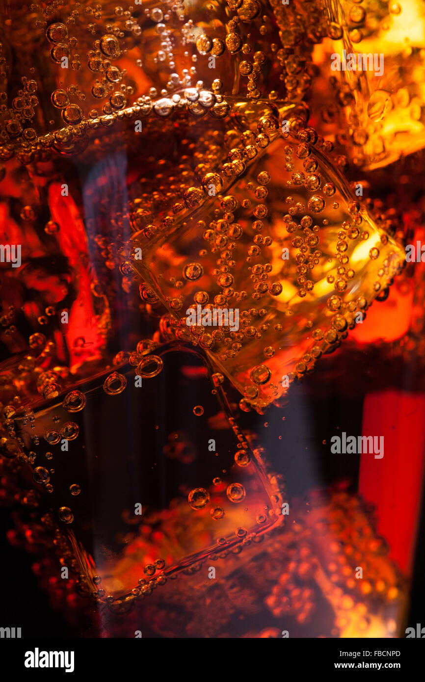 Close up view of the ice cubes in cola Stock Photo - Alamy