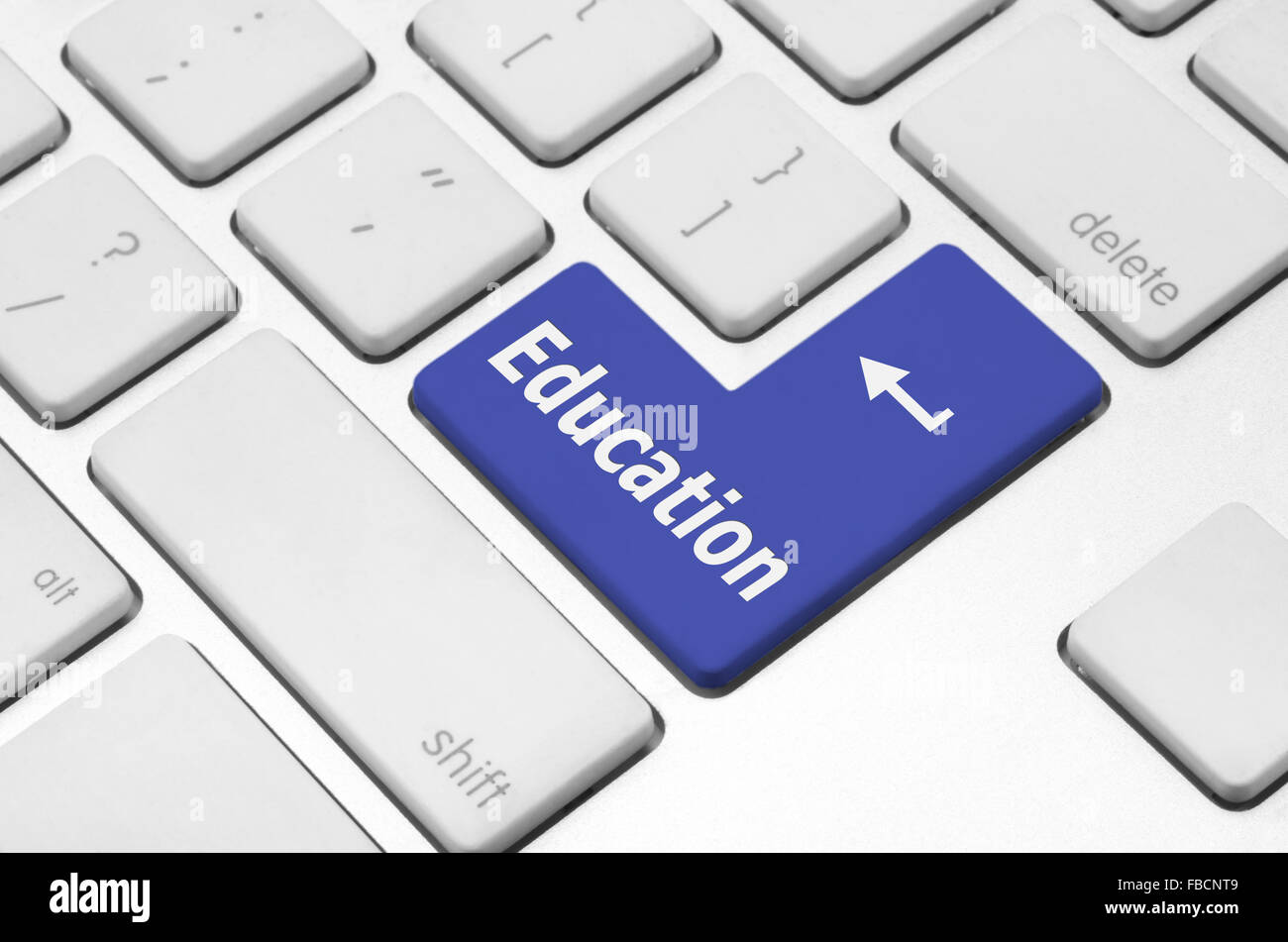 Eduaction key on the computer keyboard Stock Photo - Alamy