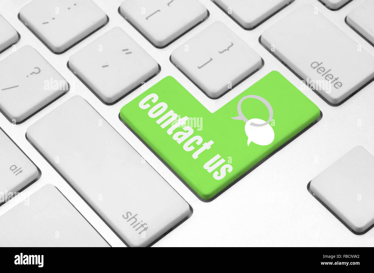 Contact us key on the computer keyboard Stock Photo - Alamy