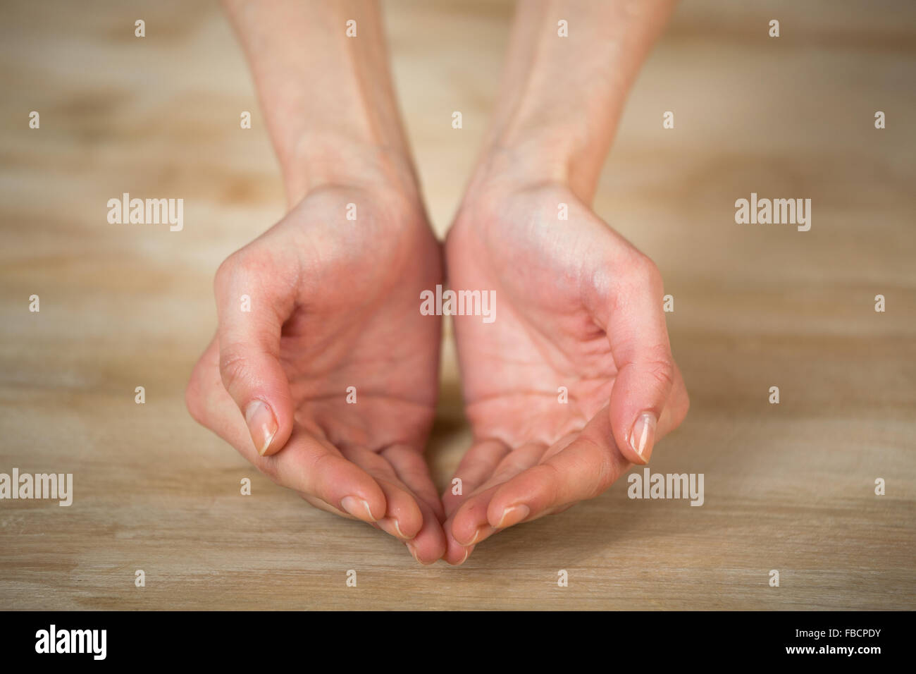 Opened female hand Stock Photo - Alamy