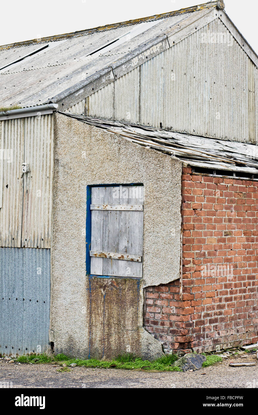Part of an old barn with crumbling brick walls Stock Photo - Alamy