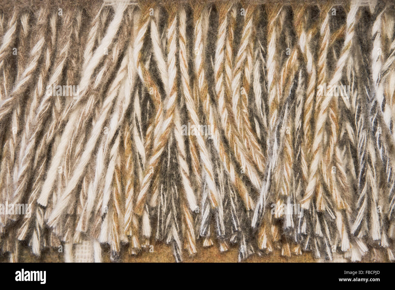 Part of the fringe of a wool blanket Stock Photo - Alamy