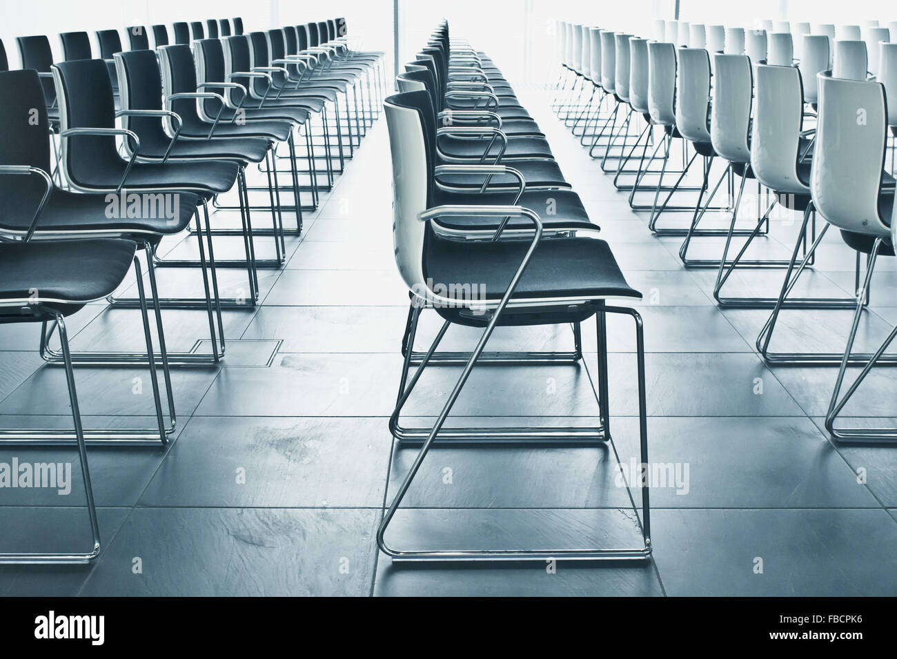 Rows of modern seats inside and empty conference hall Stock Photo - Alamy