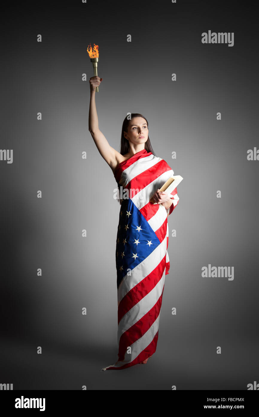 woman in the style of the statue of liberty Stock Photo - Alamy