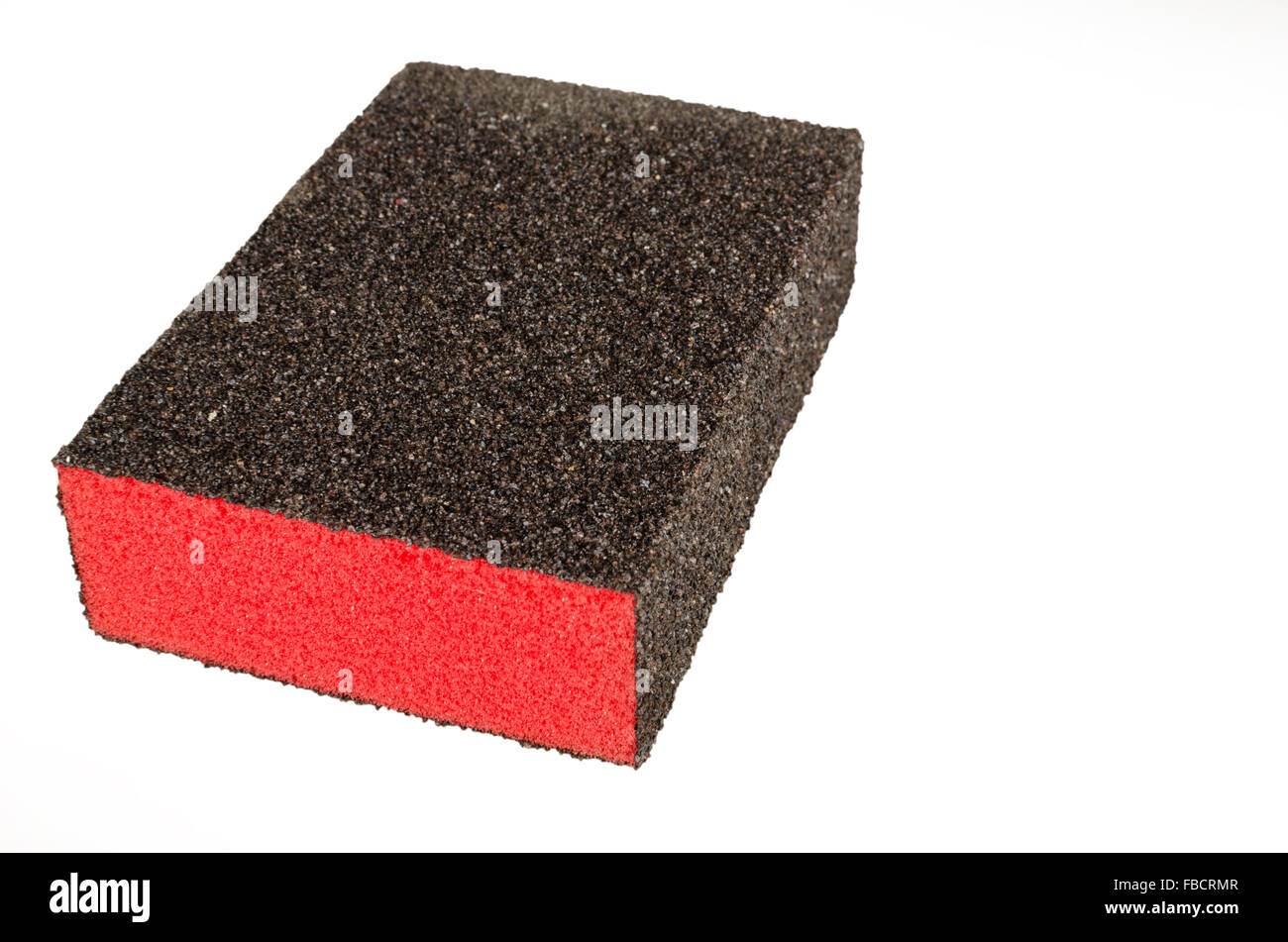 Block of very coarse sand paper on white Stock Photo - Alamy