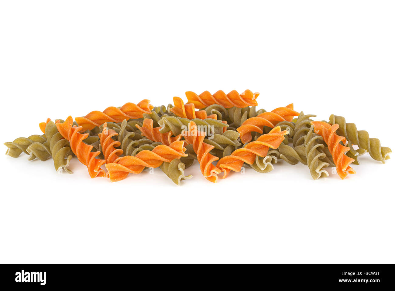 Color swirl dry pasta closeup isolated on white background Stock Photo ...