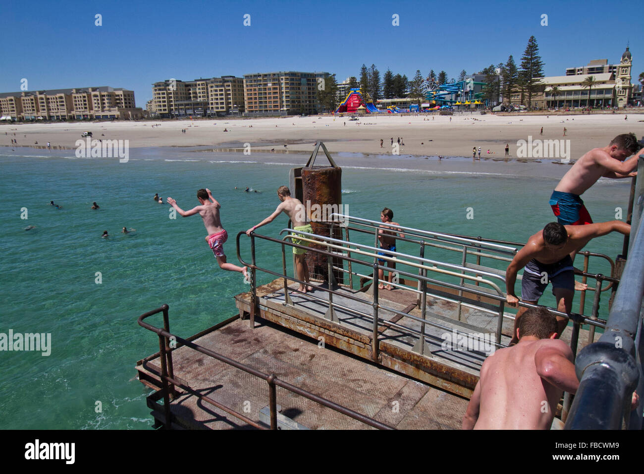 Adelaide Australia. 15th January 2016. People jump off Glenelg jetty to ...