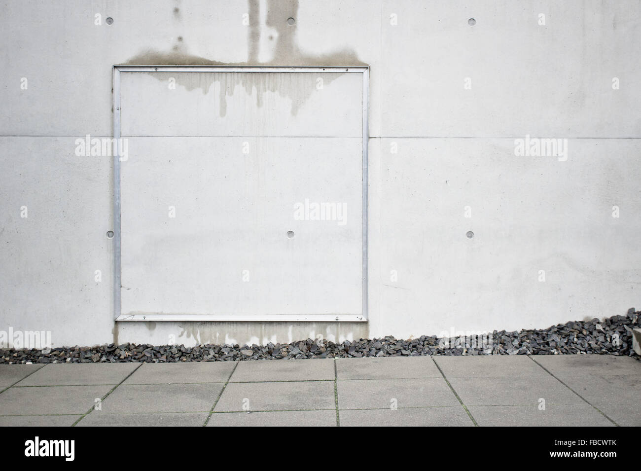 An exterior stone wall with moisture patches Stock Photo - Alamy