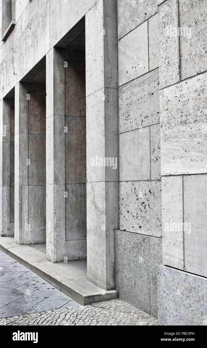 Large concrete pillars at the base of an urban building Stock Photo - Alamy