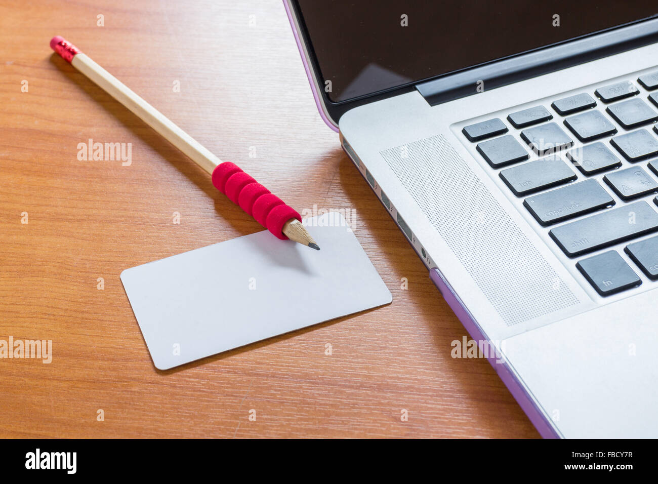 Simply freelance work table with laptop, stock photo Stock Photo - Alamy