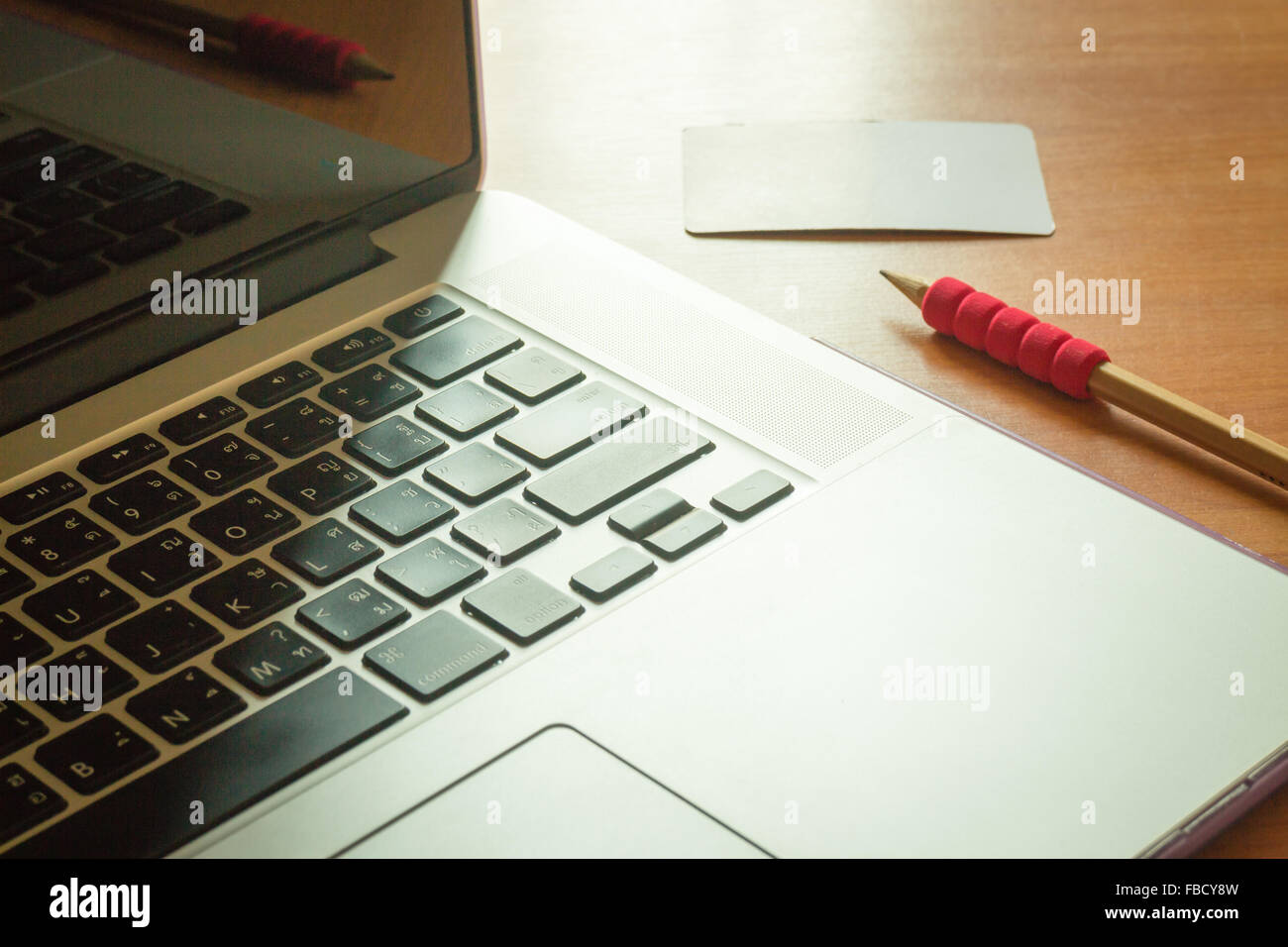 Simply freelance work table with laptop, stock photo Stock Photo - Alamy